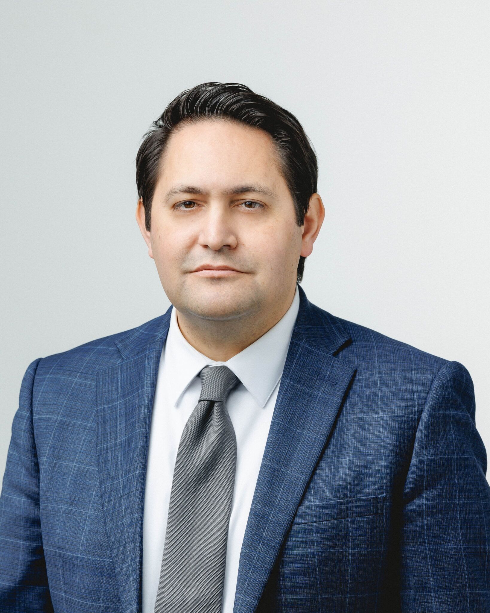 Aaron J. Flores - Flores Ryan, LLP